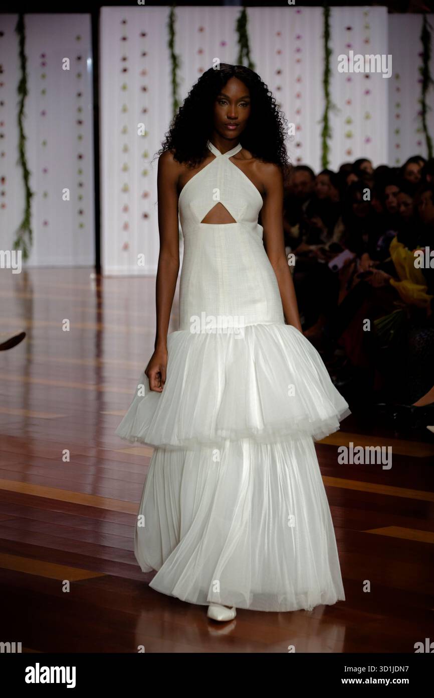 Madrid, Spain. 28th Oct, 2025. A model walks the catwalk during the ...