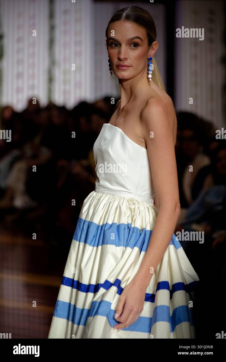 Madrid, Spain. 28th Oct, 2025. A model walks the catwalk during the ...