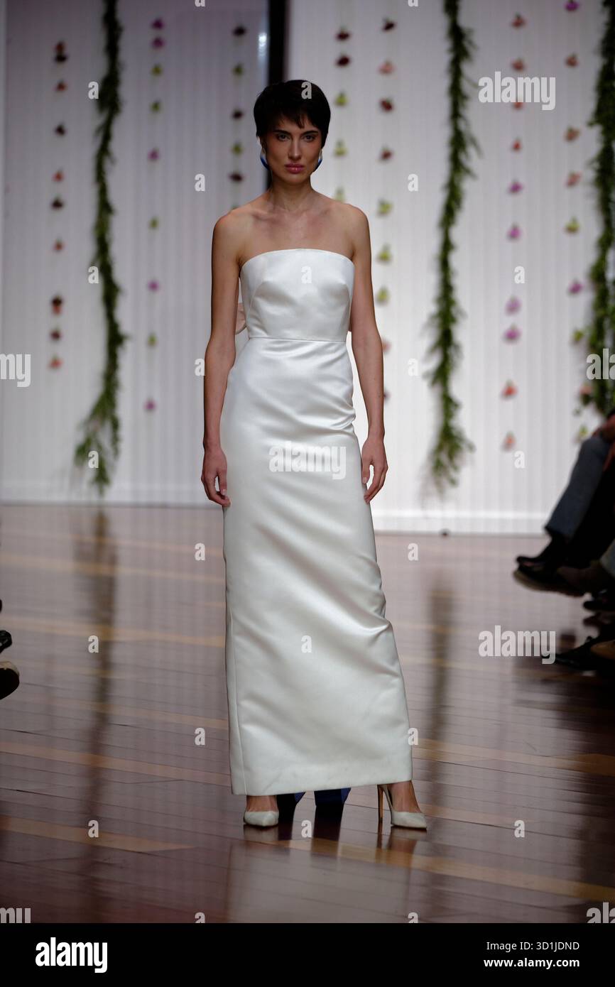 Madrid, Spain. 28th Oct, 2025. A model walks the catwalk during the ...