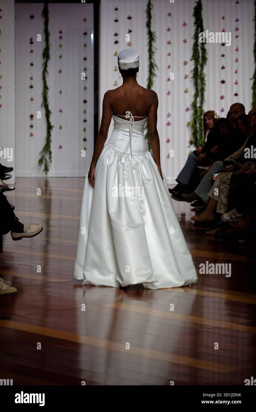 Madrid, Spain. 28th Oct, 2025. A model walks the catwalk during the ...