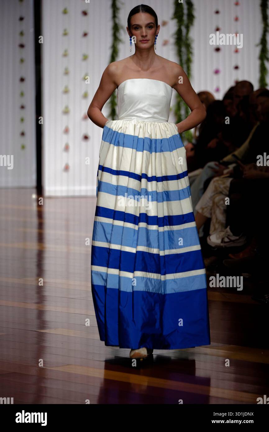Madrid, Spain. 28th Oct, 2025. A model walks the catwalk during the ...
