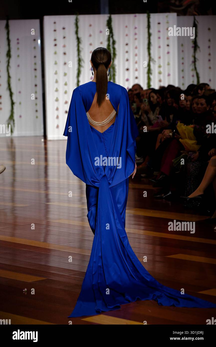 Madrid, Spain. 28th Oct, 2025. A model walks the catwalk during the ...