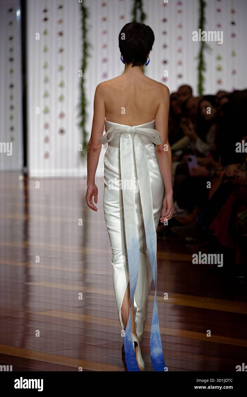 Madrid, Spain. 28th Oct, 2025. A model walks the catwalk during the ...