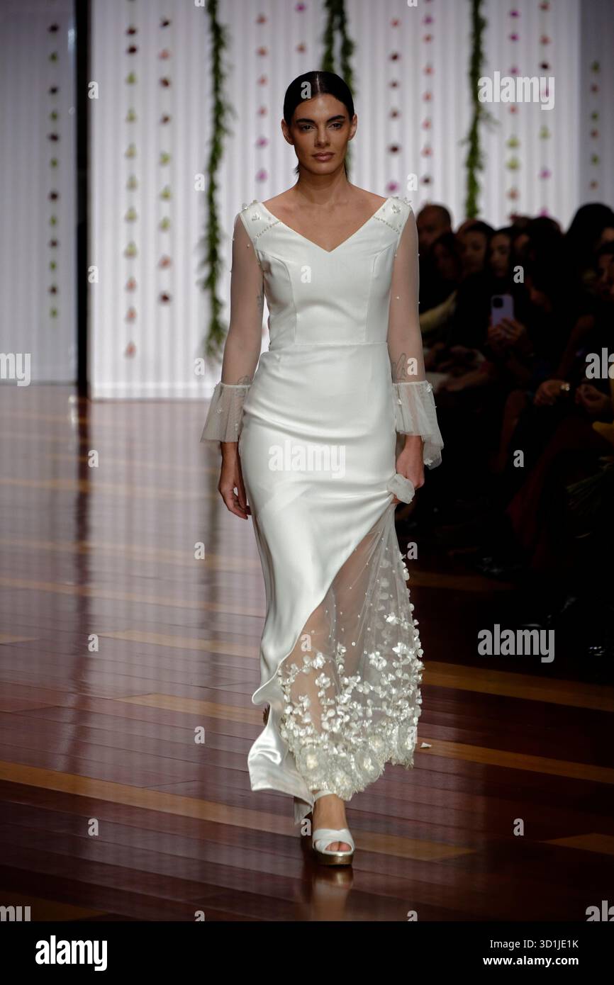 Madrid, Spain. 28th Oct, 2025. A model walks the catwalk during the ...