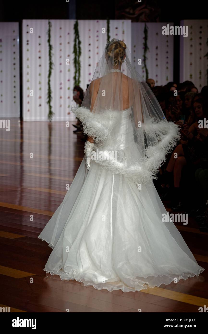 Madrid, Spain. 28th Oct, 2025. A model walks the catwalk during the ...