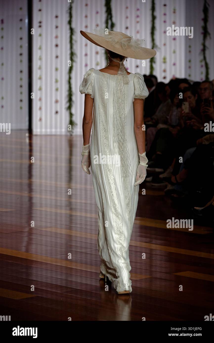 Madrid, Spain. 28th Oct, 2025. A model walks the catwalk during the ...