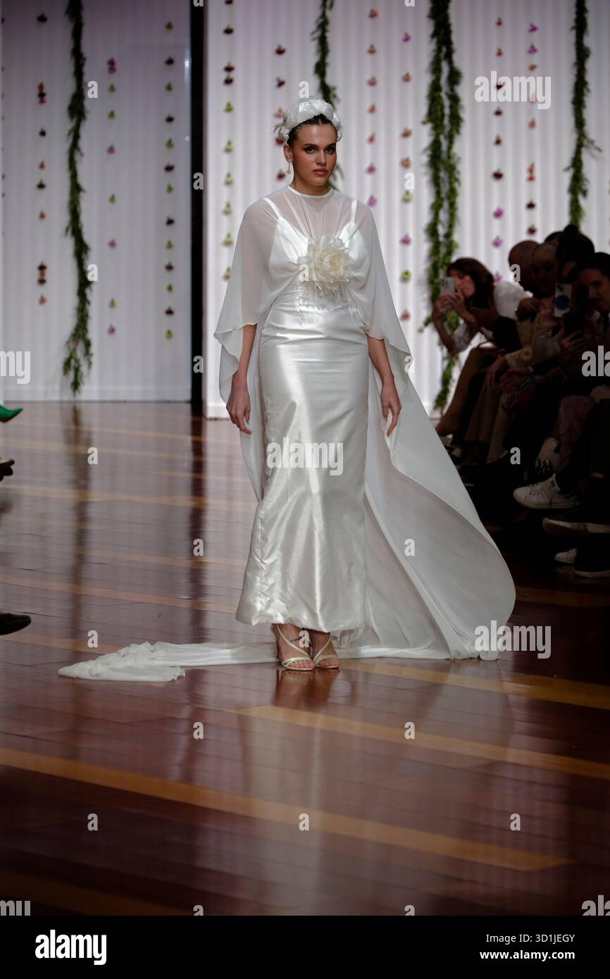 Madrid, Spain. 28th Oct, 2025. A model walks the catwalk during the ...