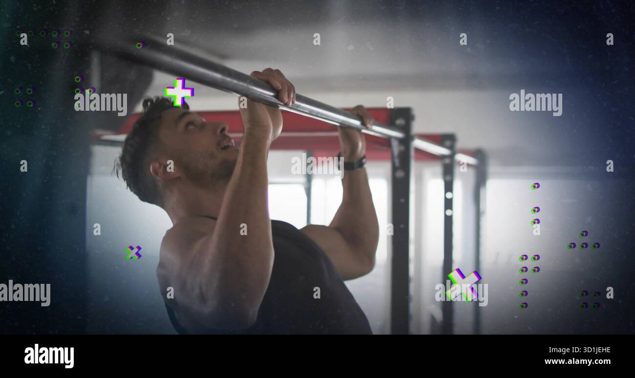 Lifting athlete wearing sleeveless top pulling chin above pull-up bar ...