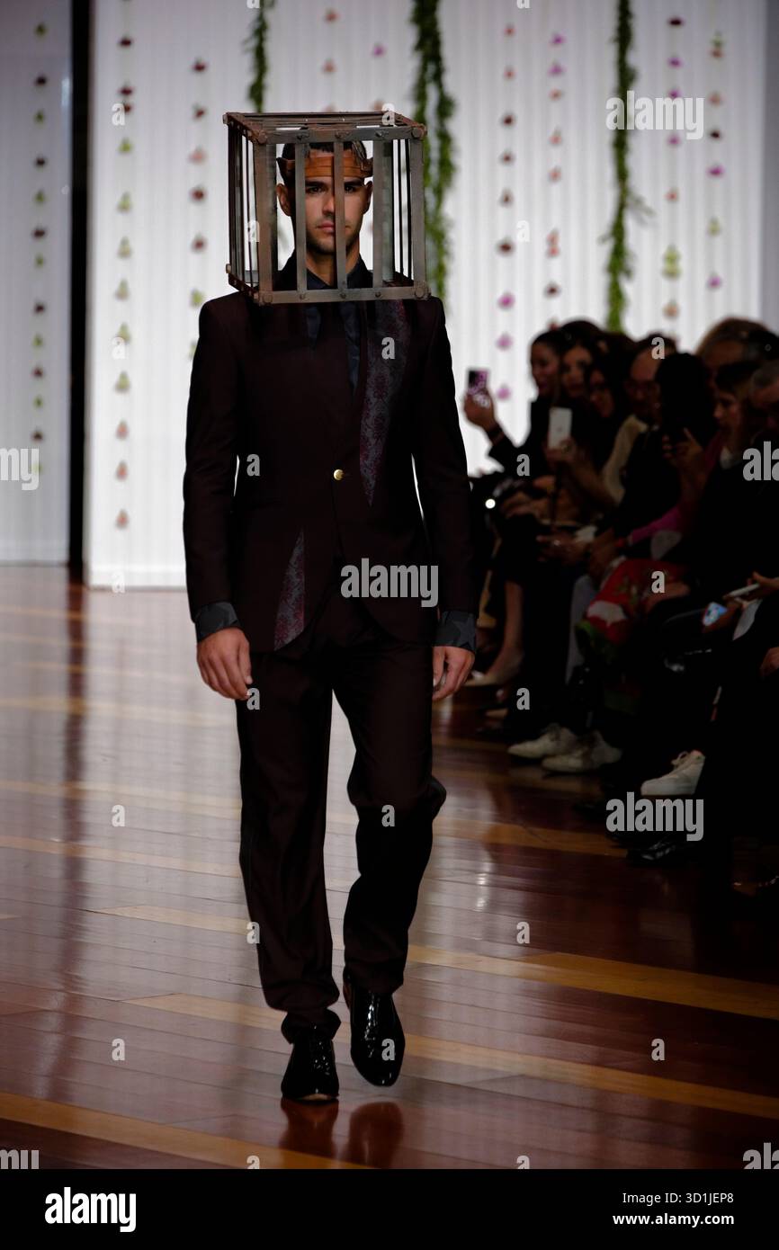Madrid, Spain. 28th Oct, 2025. A model walks the catwalk during the ...