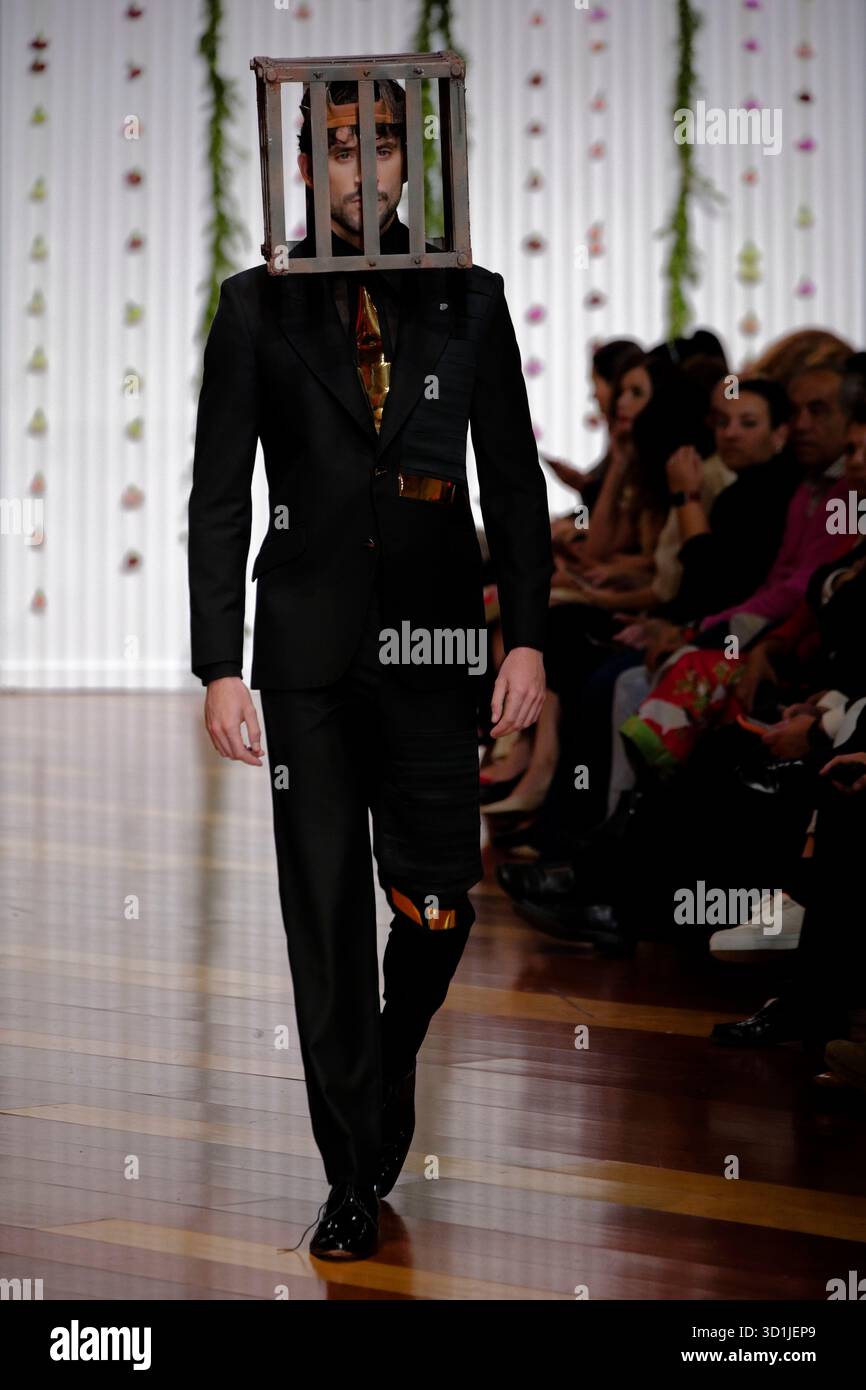 Madrid, Spain. 28th Oct, 2025. A model walks the catwalk during the ...
