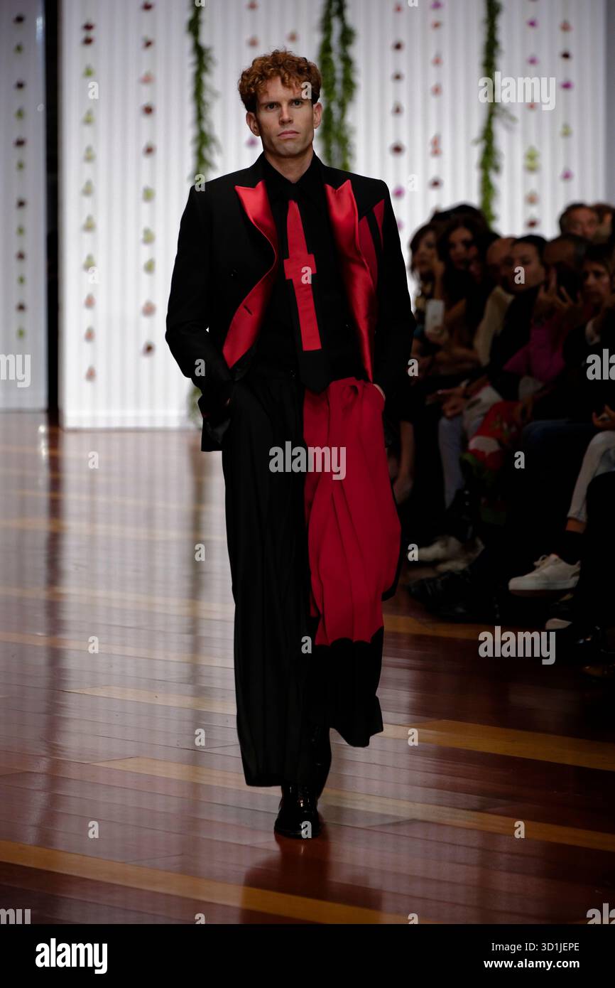 Madrid, Spain. 28th Oct, 2025. A model walks the catwalk during the ...