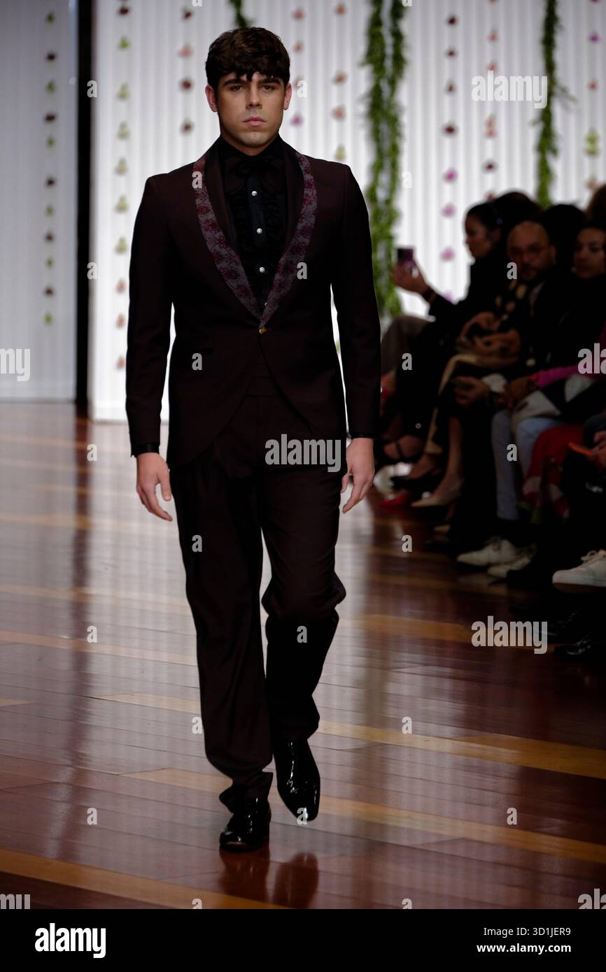 Madrid, Spain. 28th Oct, 2025. A model walks the catwalk during the ...
