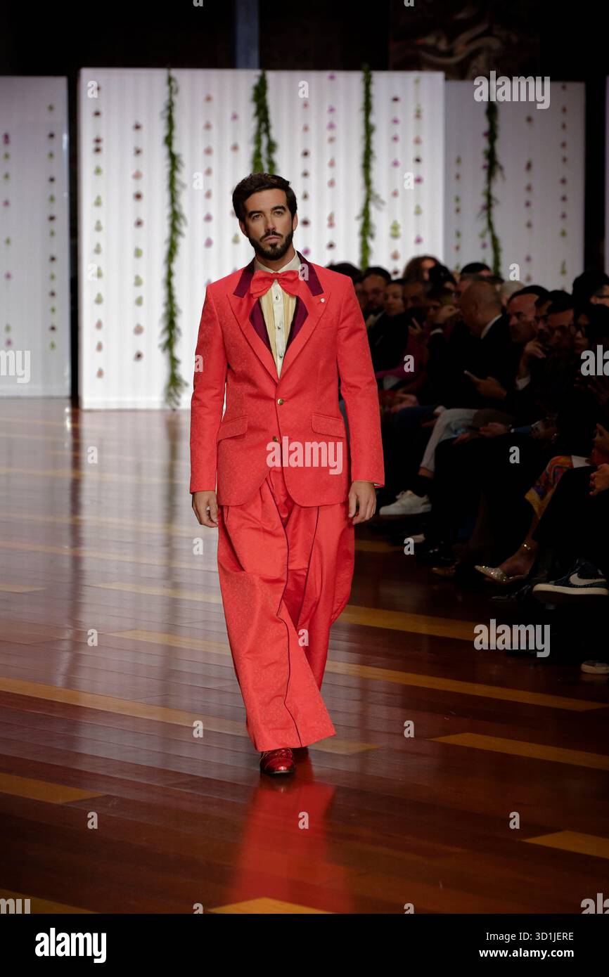 Madrid, Spain. 28th Oct, 2025. A model walks the catwalk during the ...