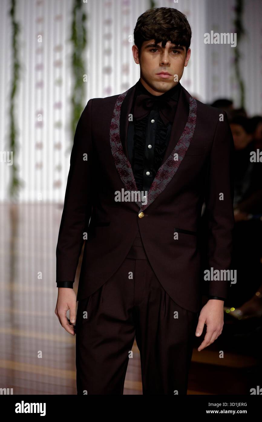 Madrid, Spain. 28th Oct, 2025. A model walks the catwalk during the ...