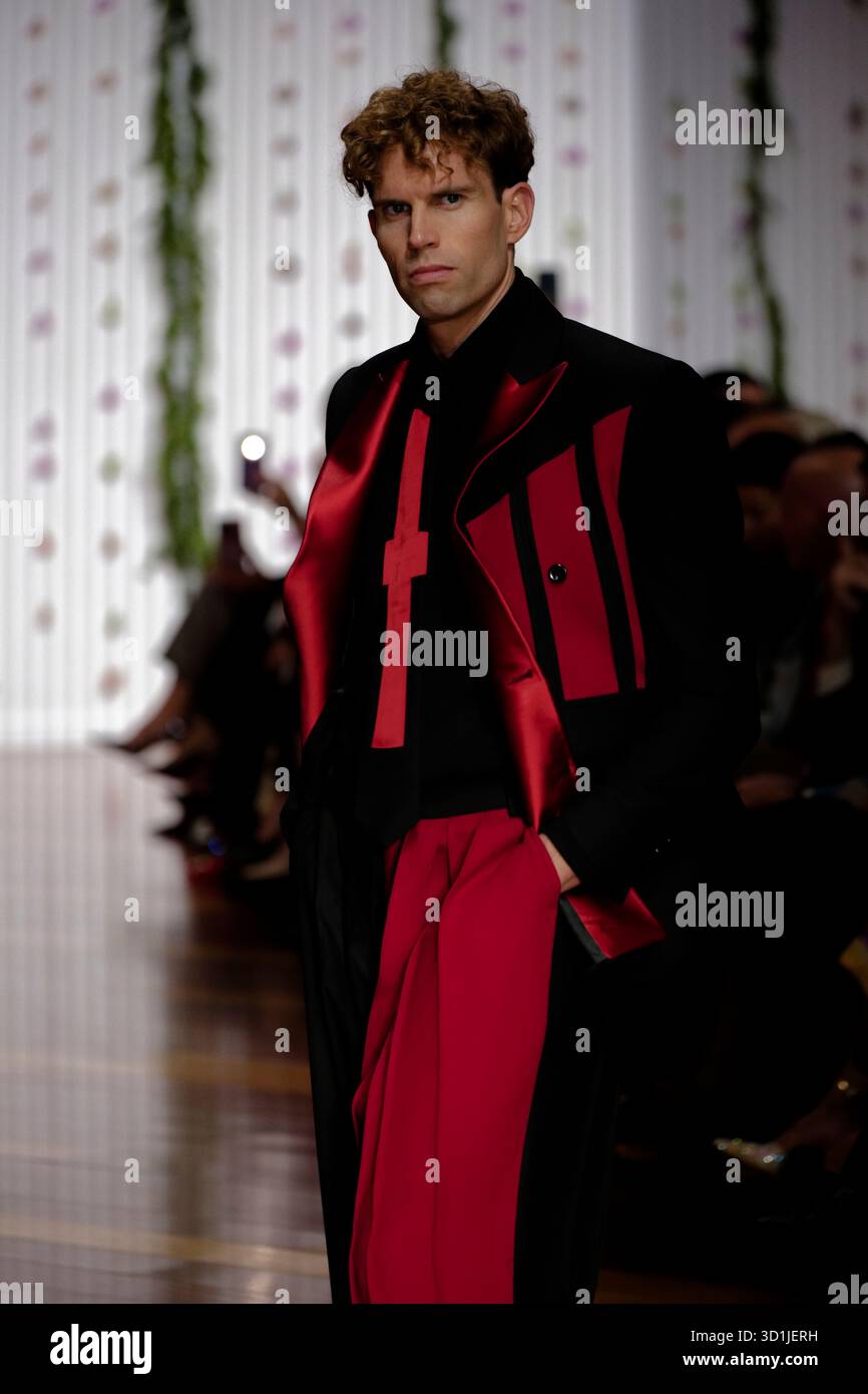 Madrid, Spain. 28th Oct, 2025. A model walks the catwalk during the ...