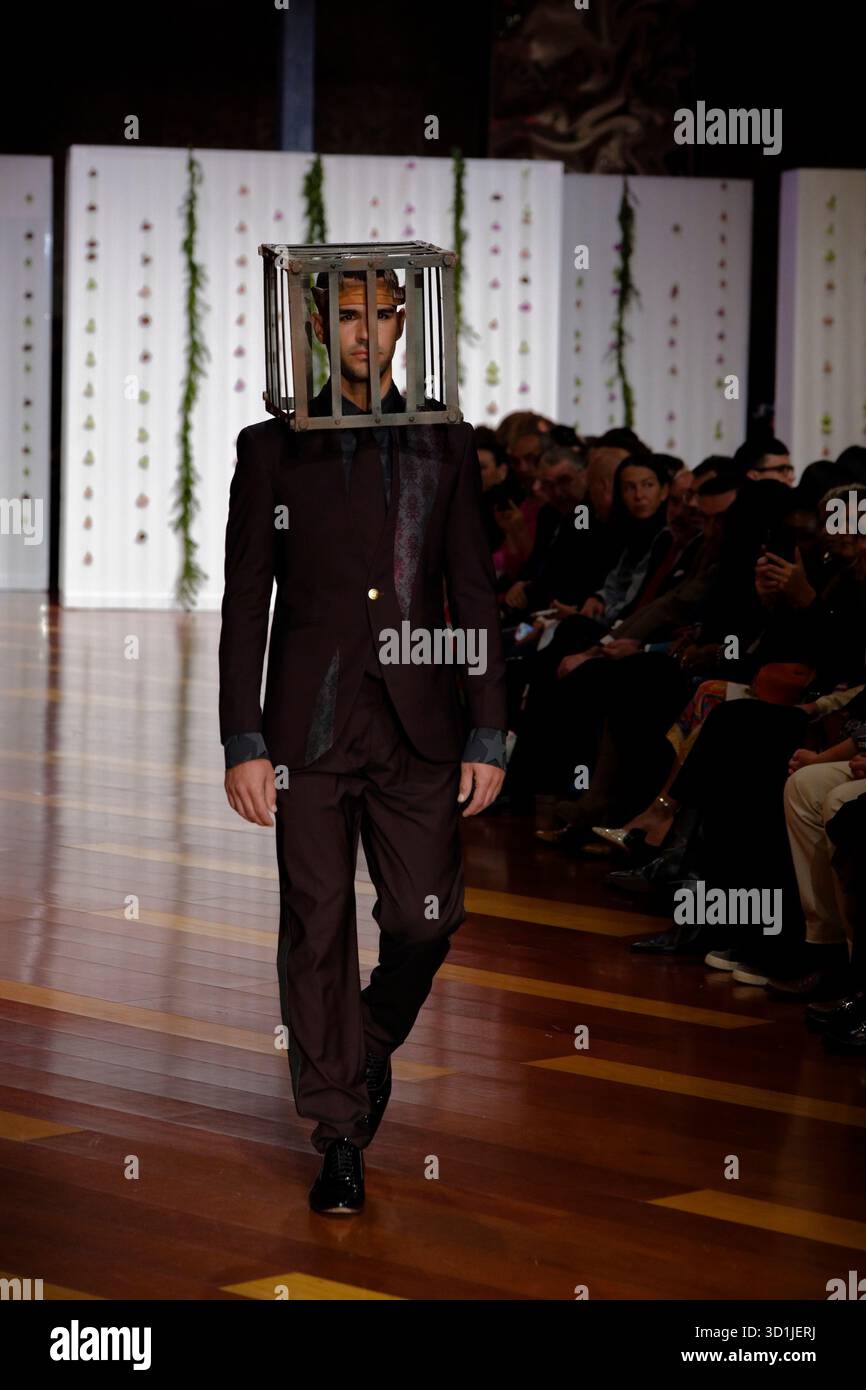 Madrid, Spain. 28th Oct, 2025. A model walks the catwalk during the ...
