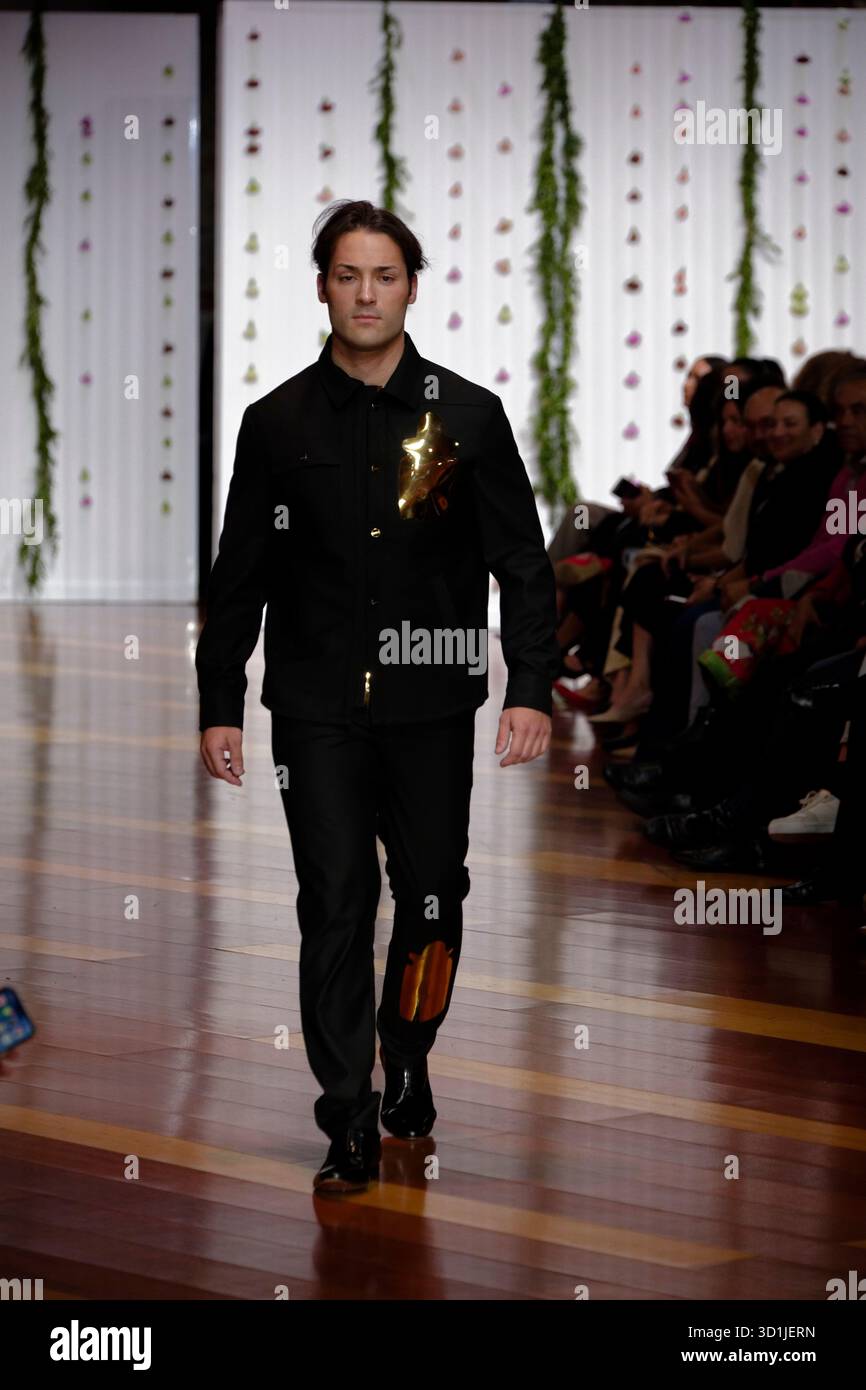 Madrid, Spain. 28th Oct, 2025. A model walks the catwalk during the ...