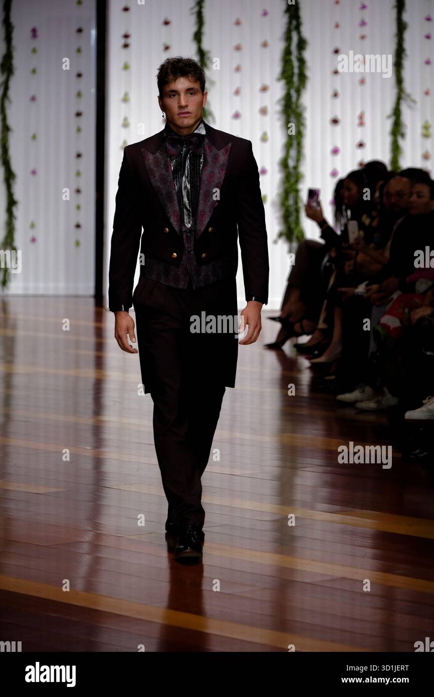 Madrid, Spain. 28th Oct, 2025. A model walks the catwalk during the ...
