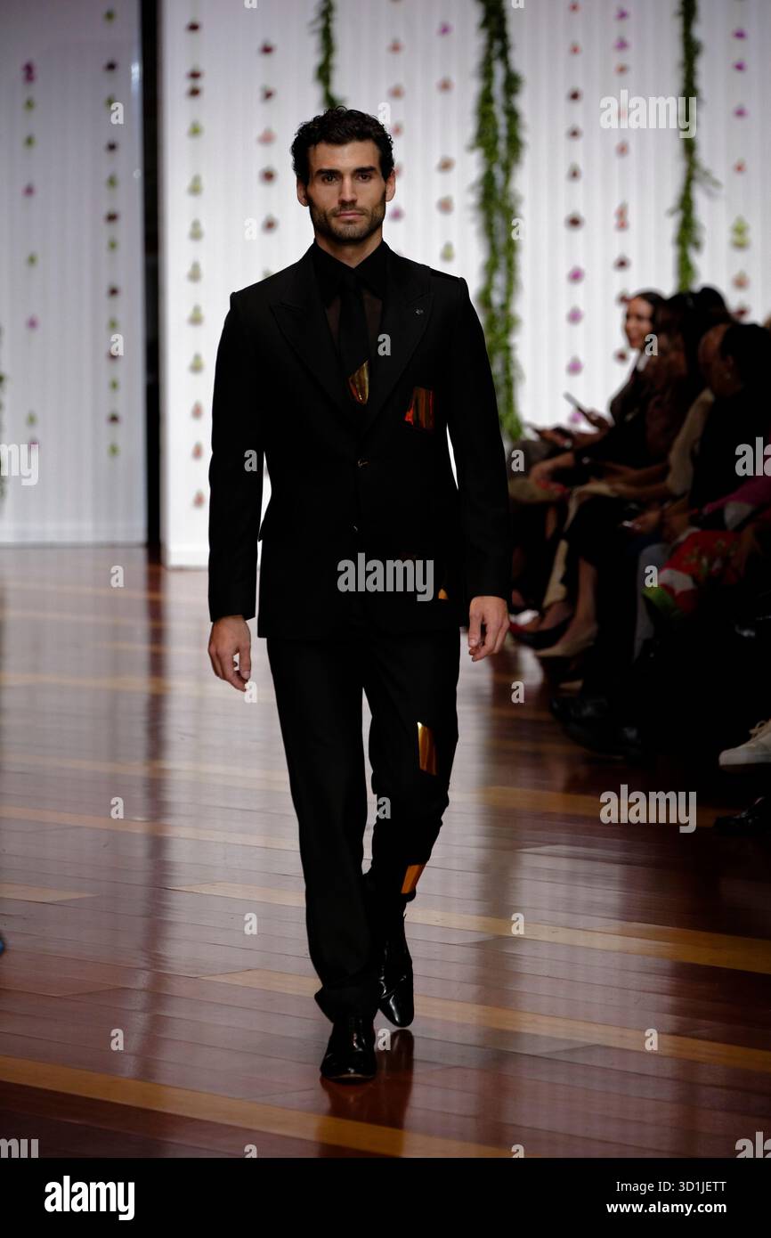 Madrid, Spain. 28th Oct, 2025. A model walks the catwalk during the ...