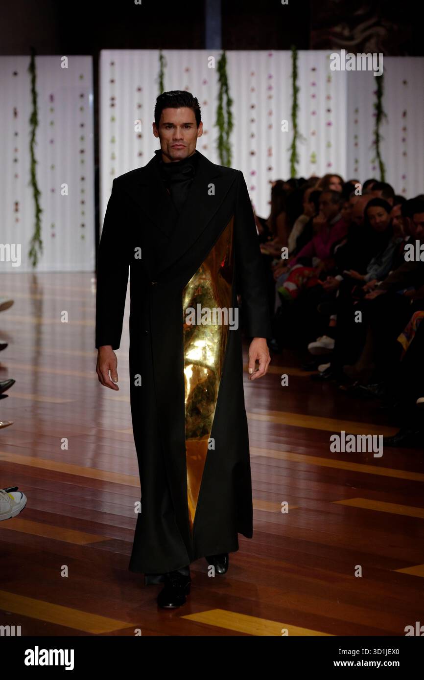 Madrid, Spain. 28th Oct, 2025. A model walks the catwalk during the ...