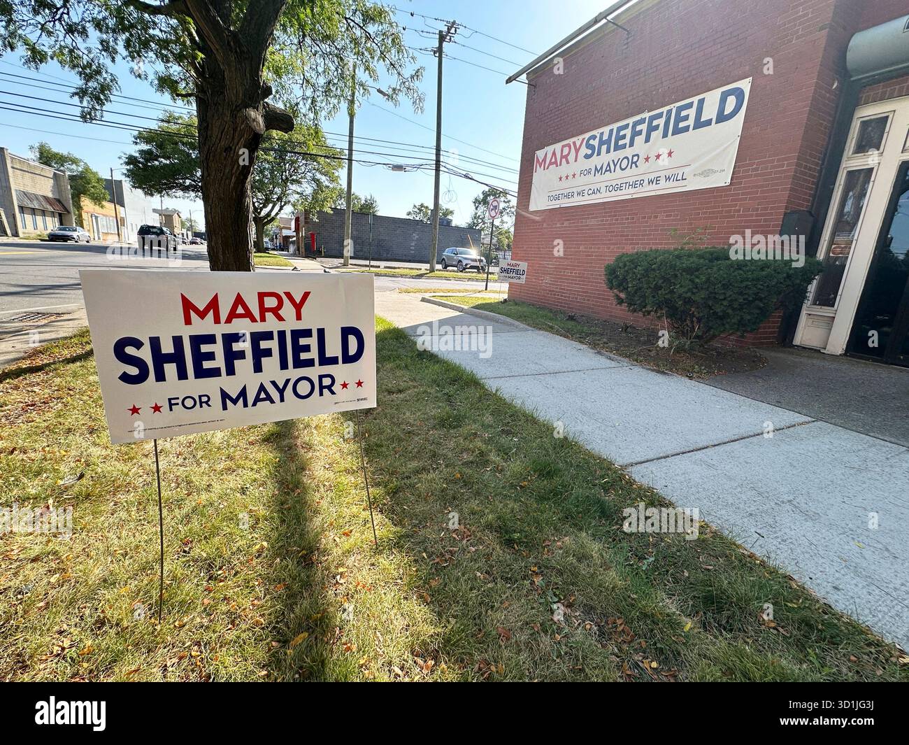 A lawn sign and banner are pictured on display outside a campaign ...