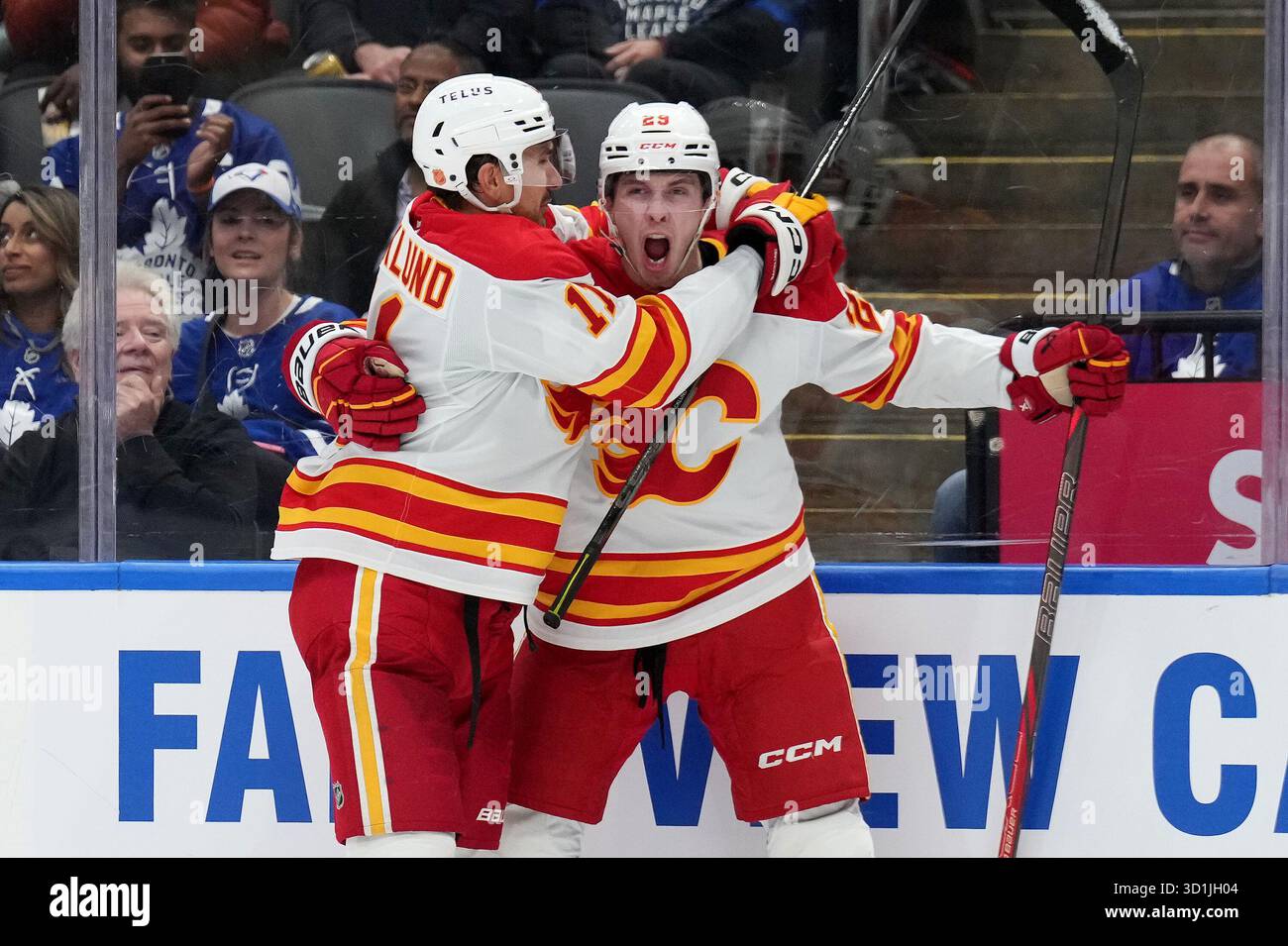 Calgary Flames forward Samuel Honzek (29) celebrates his goal with ...