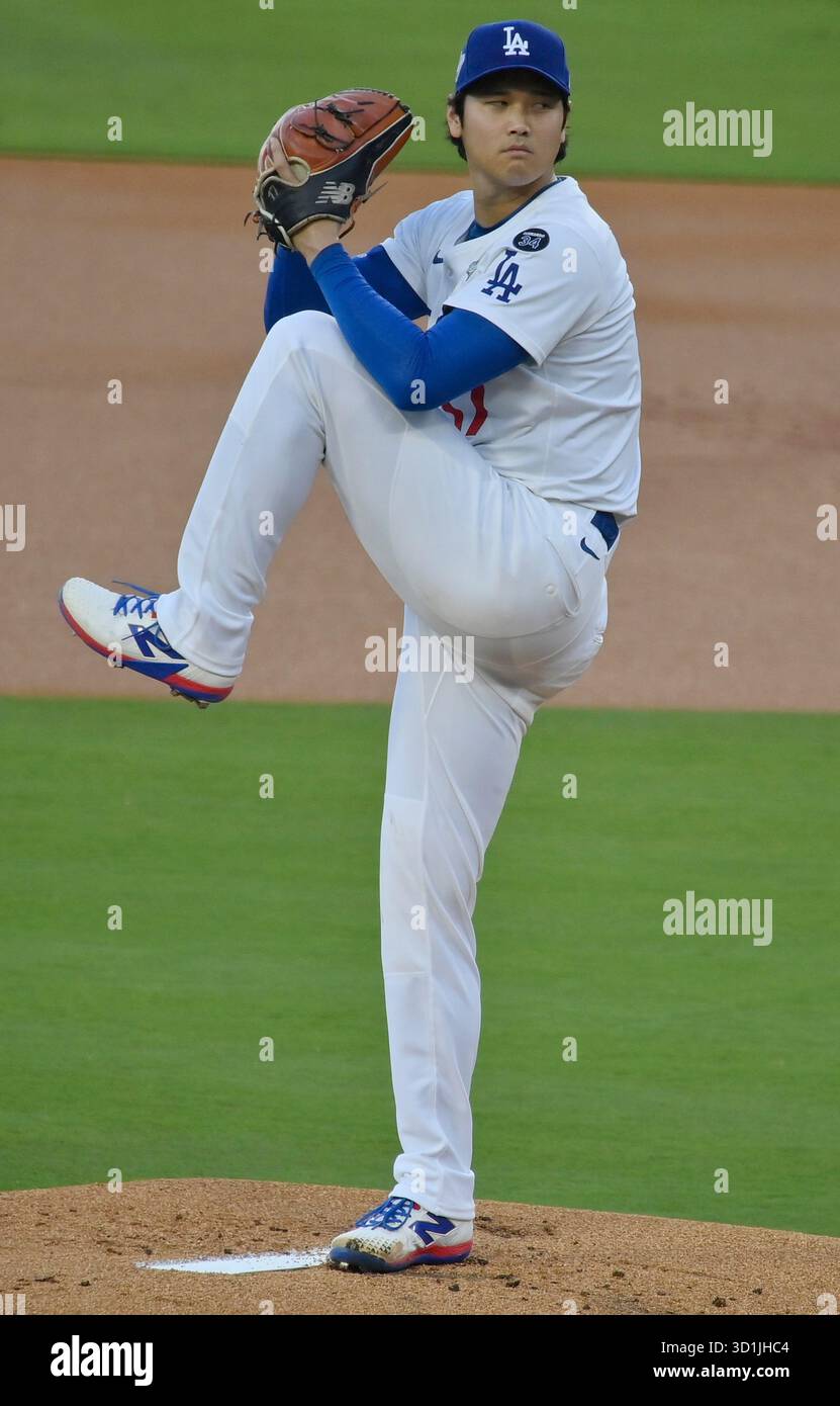 Los Angeles Dodgers starting pitcher Shohei Ohtani (17) throws in the ...