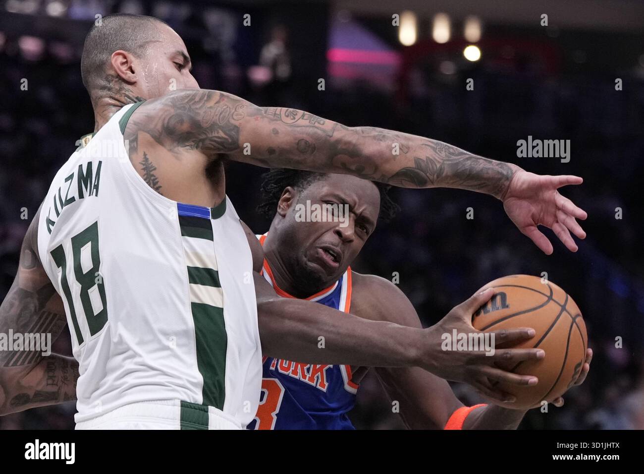 Milwaukee Bucks' Kyle Kuzma fouls New York Knicks' OG Anunoby during ...
