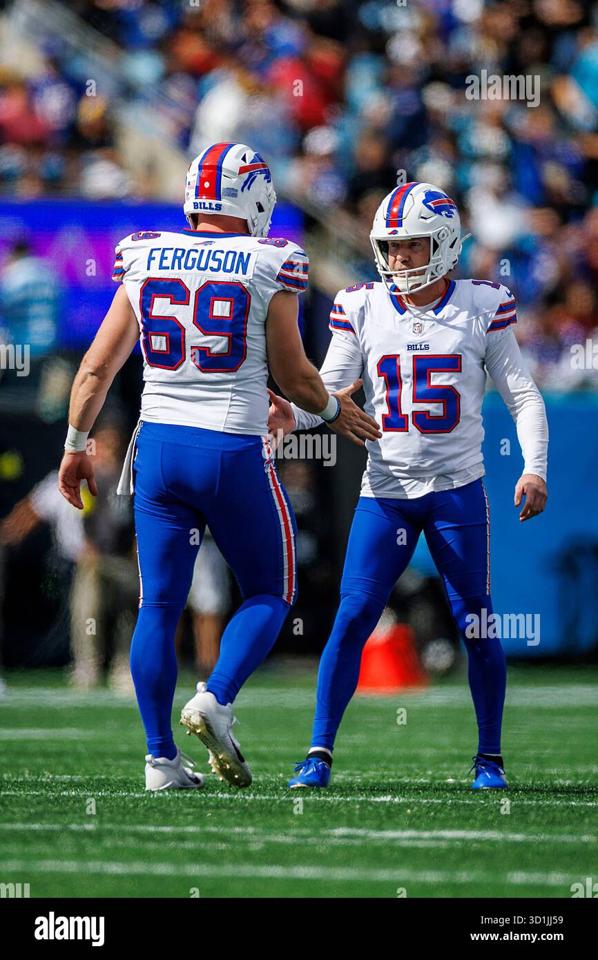 Buffalo Bills long snapper Reid Ferguson (69) congratulates kicker Matt ...