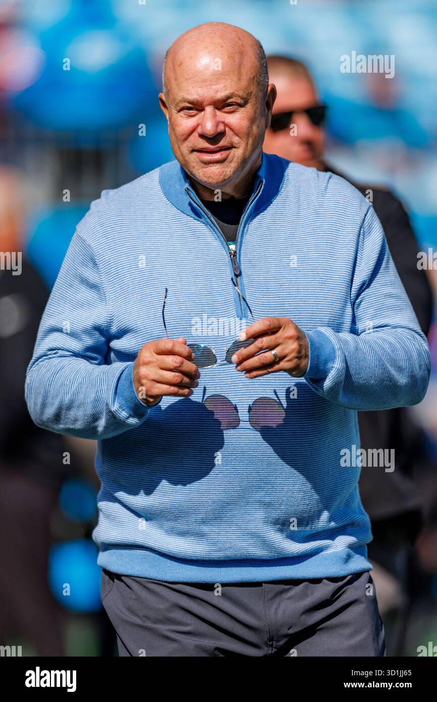 Carolina Panthers owner David Tepper walks the sidelines before an NFL ...