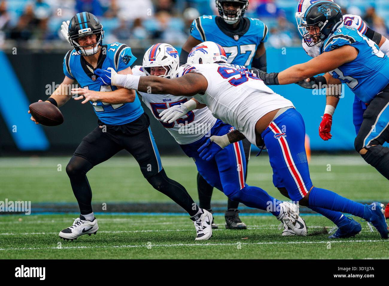 Carolina Panthers quarterback Andy Dalton (14) is sacked by Buffalo ...