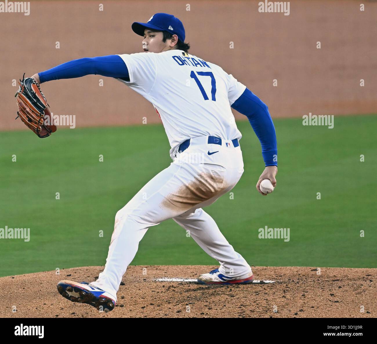 Los Angeles Dodgers starting pitcher Shohei Ohtani pitches in the ...