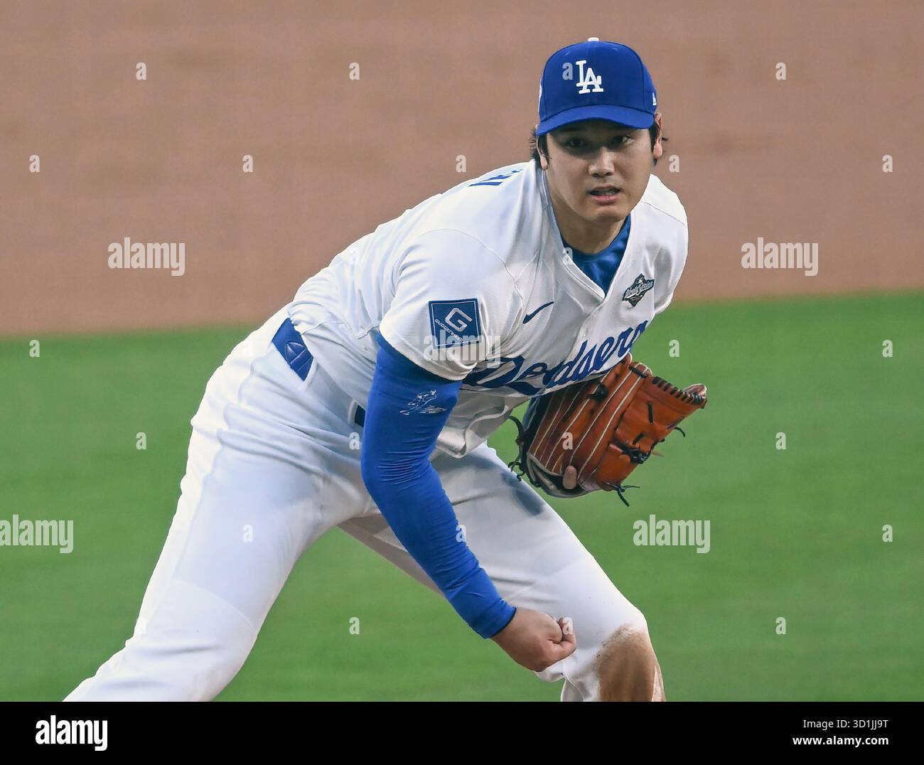 Los Angeles Dodgers starting pitcher Shohei Ohtani pitches in the ...