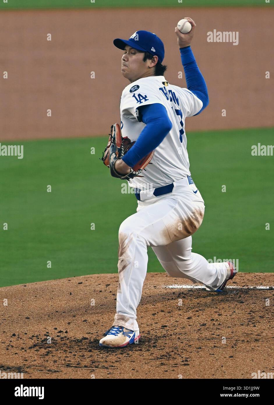 Los Angeles Dodgers starting pitcher Shohei Ohtani pitches in the ...