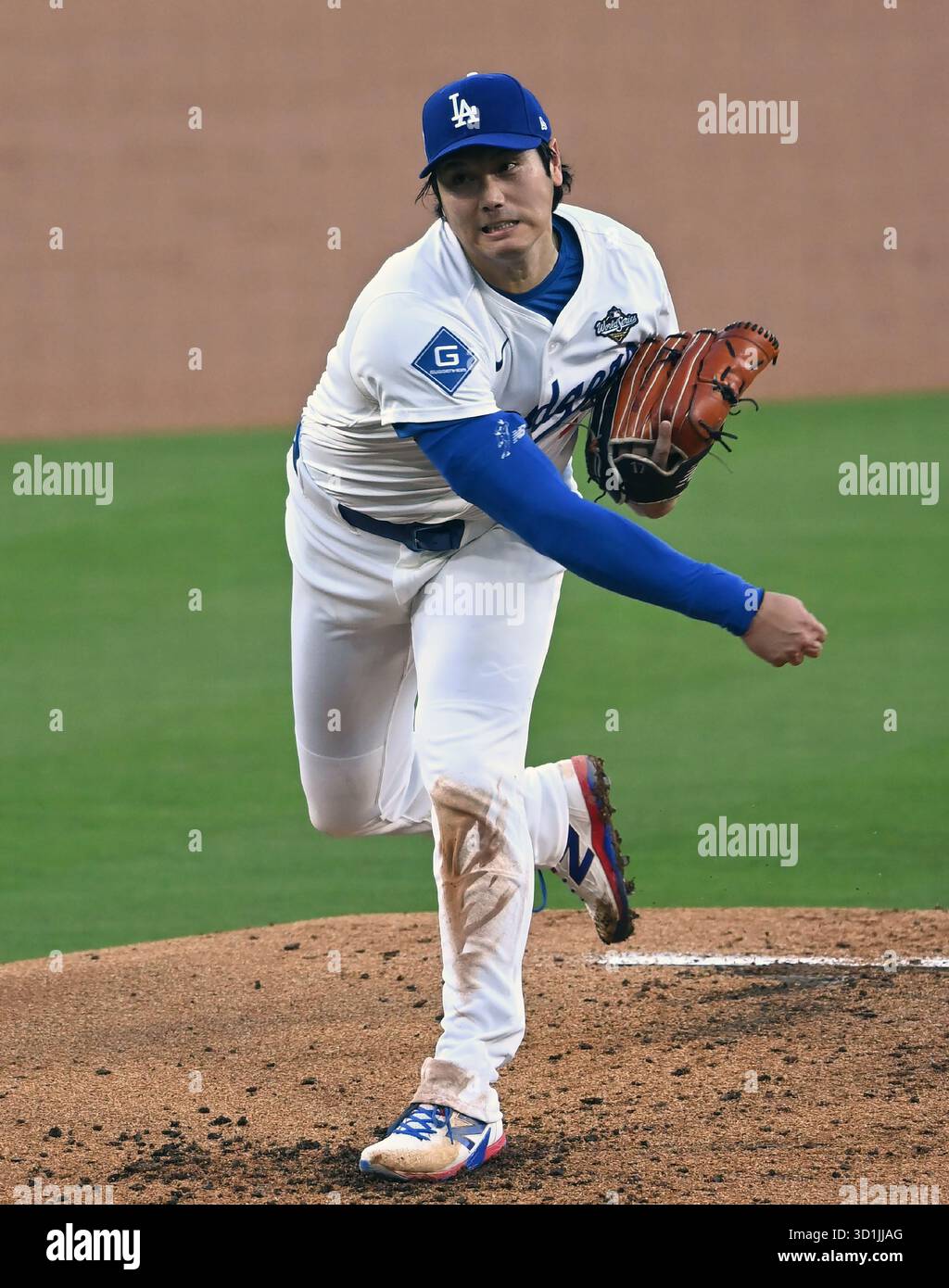 Los Angeles Dodgers starting pitcher Shohei Ohtani pitches in the ...