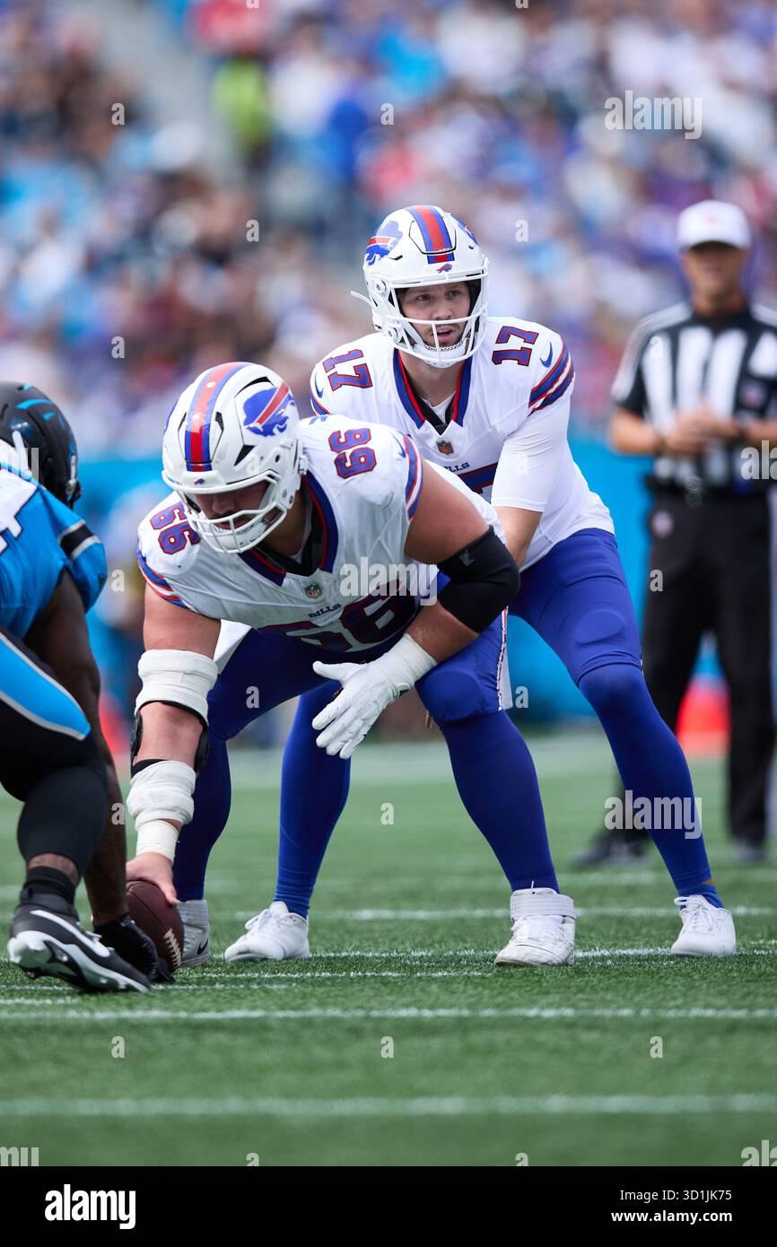 Buffalo Bills quarterback Josh Allen (17) lines up behind center Connor ...