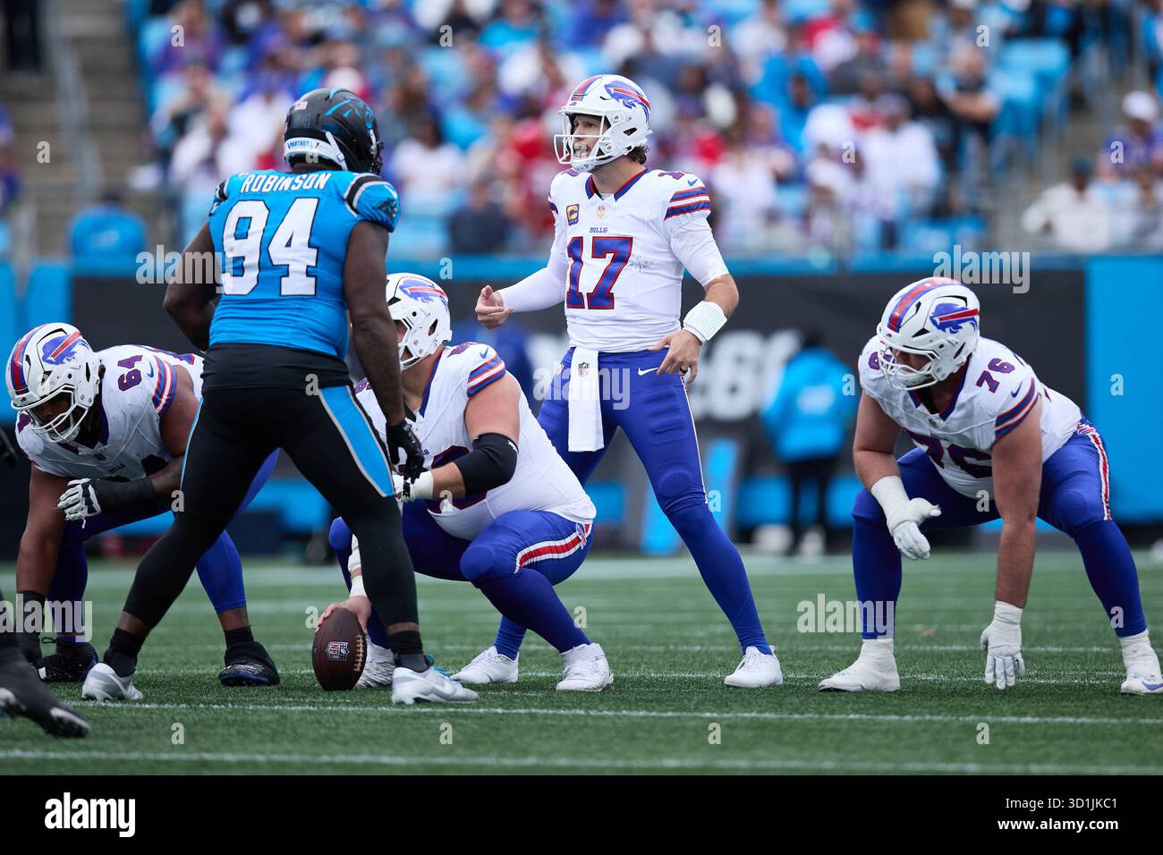 Buffalo Bills quarterback Josh Allen (17) looks over the defense during ...