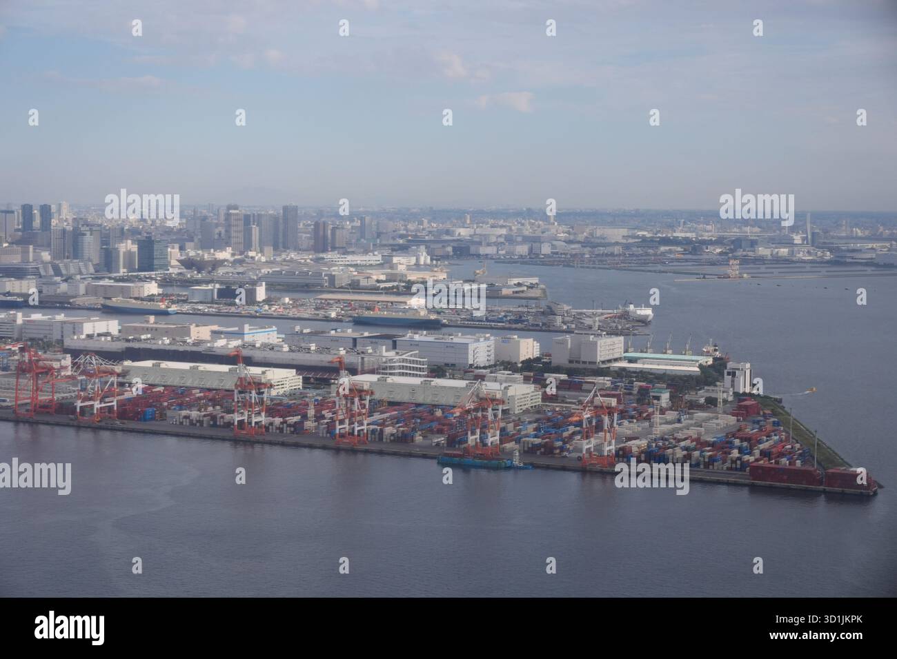 A general view of a container port seen from a helicopter in Tokyo ...