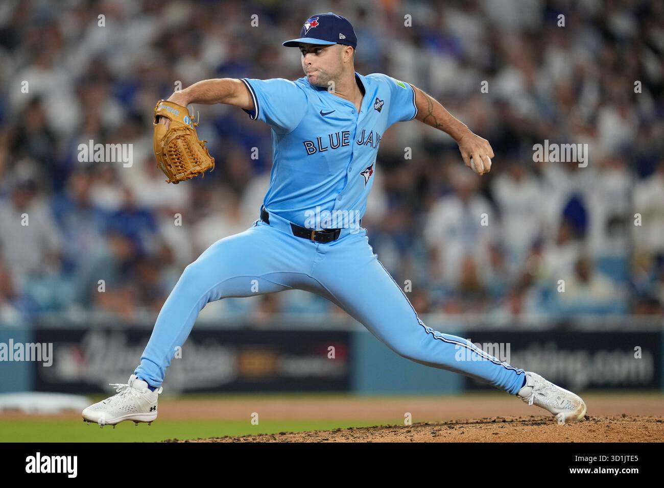 Toronto Blue Jays' pitcher Mason Fluharty throwsduring the sixth inning ...