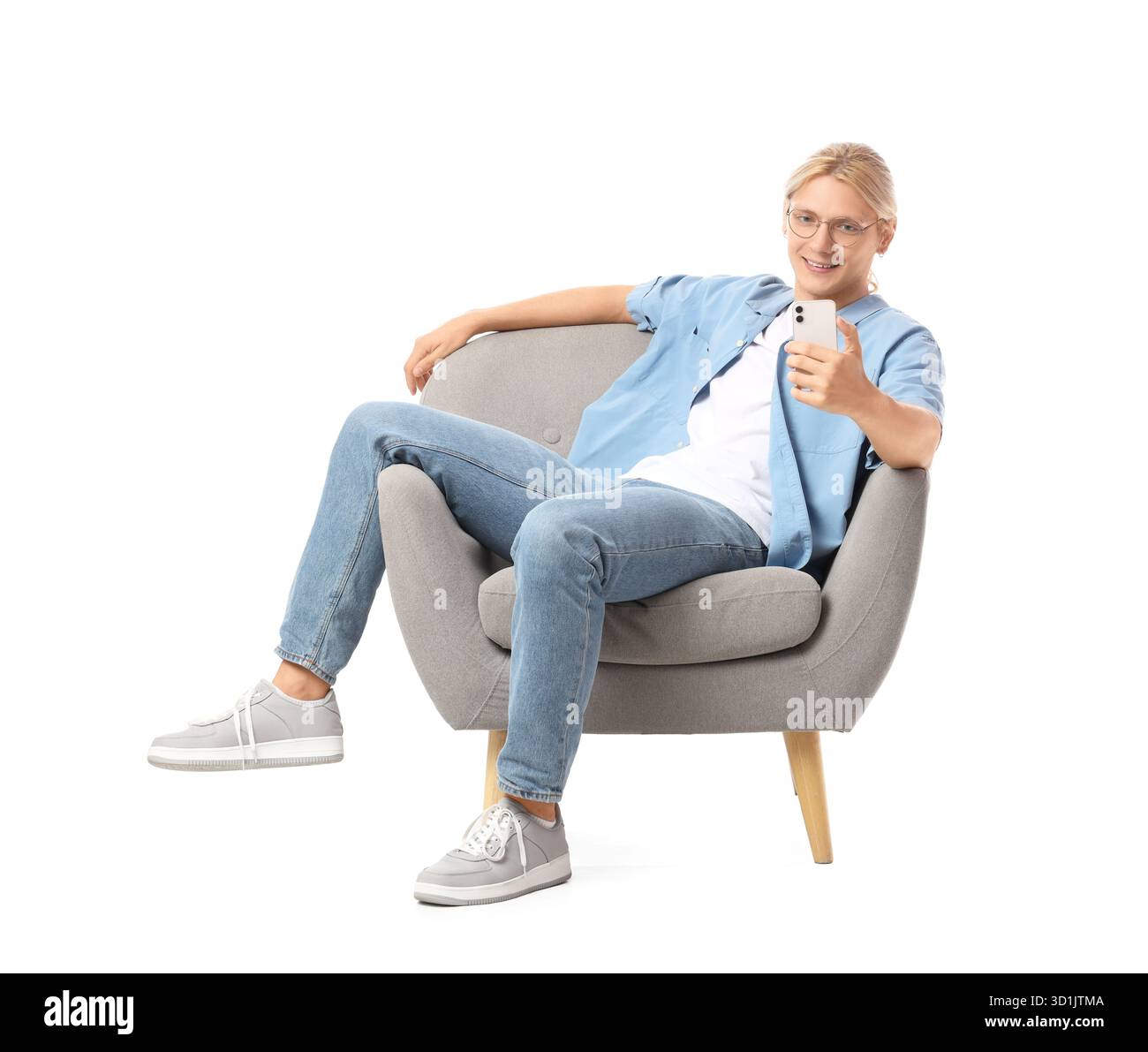 Man home using mobile Cut Out Stock Images & Pictures - Alamy