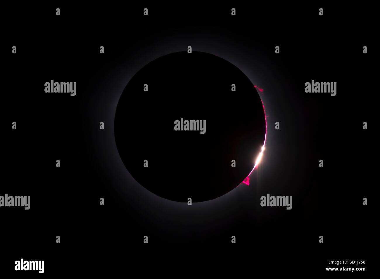 Baily's beads during a total solar eclipse in 2024. These are bright ...