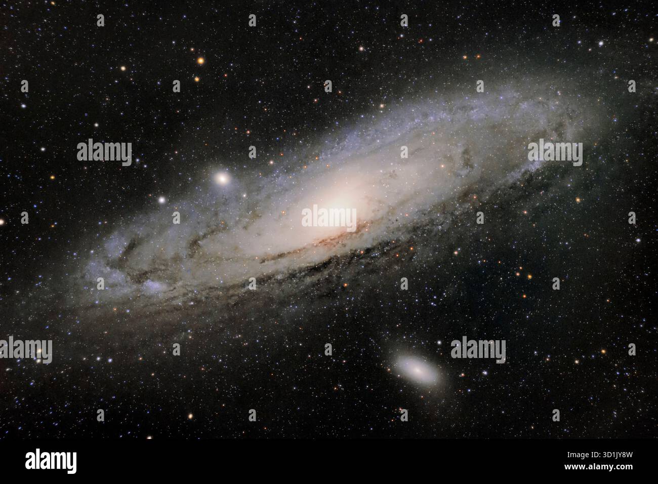 Long-exposure telescopic image of the Andromeda Galaxy and its two ...