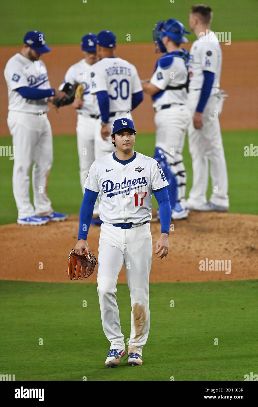 Los Angeles Dodgers starting pitcher Shohei Ohtani reacts as he leaves ...
