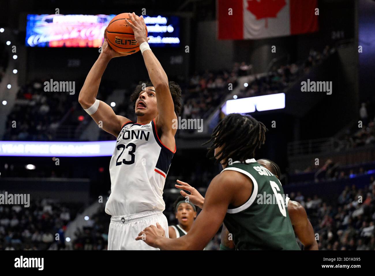 UConn forward Jayden Ross (23) shoots against Michigan State forward ...