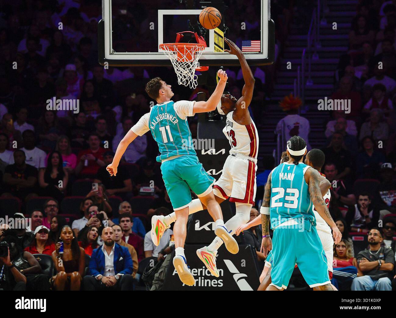 Miami Heat forward Bam Adebayo (13) scores in front or Charlotte ...