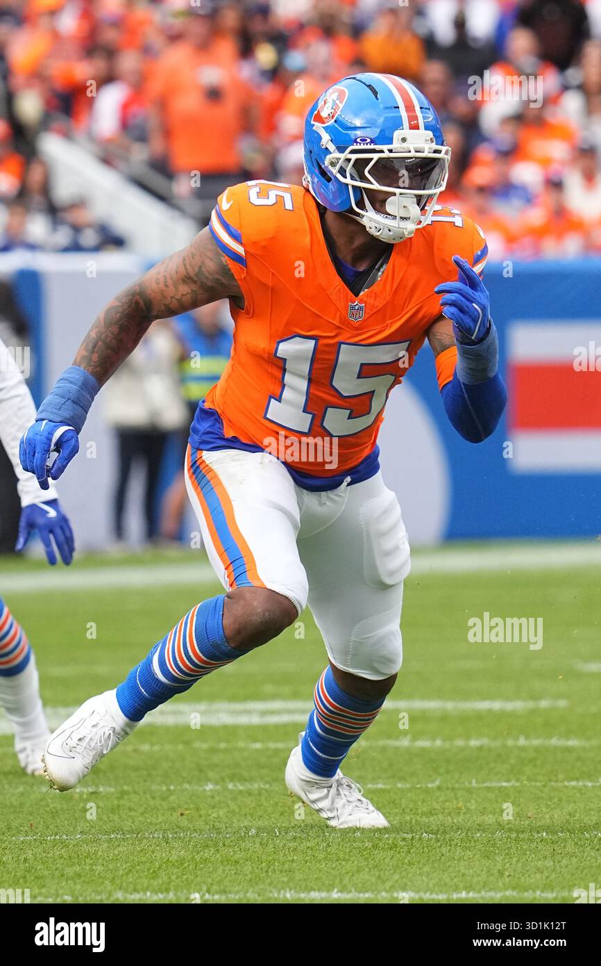 Denver Broncos linebacker Nik Bonitto (15) rushes the quarterback ...
