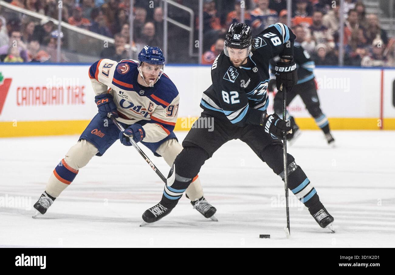 Utah Mammoth's Kevin Stenlund (82) is chased by Edmonton Oilers' Connor ...