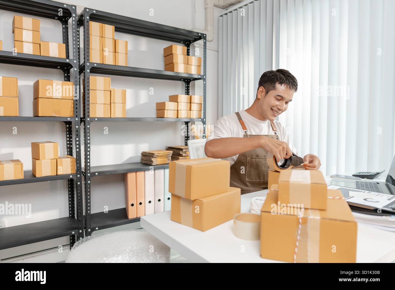 Ecommerce concept with startup entrepreneur handling goods, showing ...