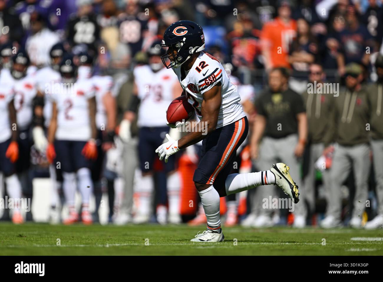 Chicago Bears wide receiver Devin Duvernay (12) returns a kickoff ...