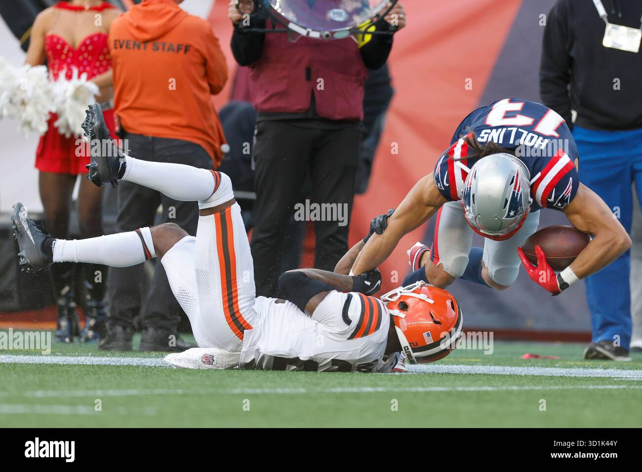 Cleveland Browns cornerback Denzel Ward (21) tackles New England ...